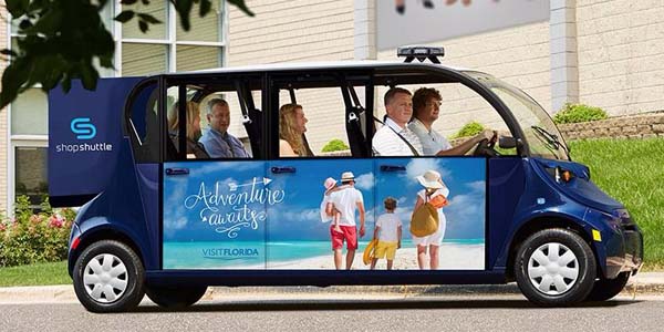 Branded vehicles shuttle mall customers - Sign Media